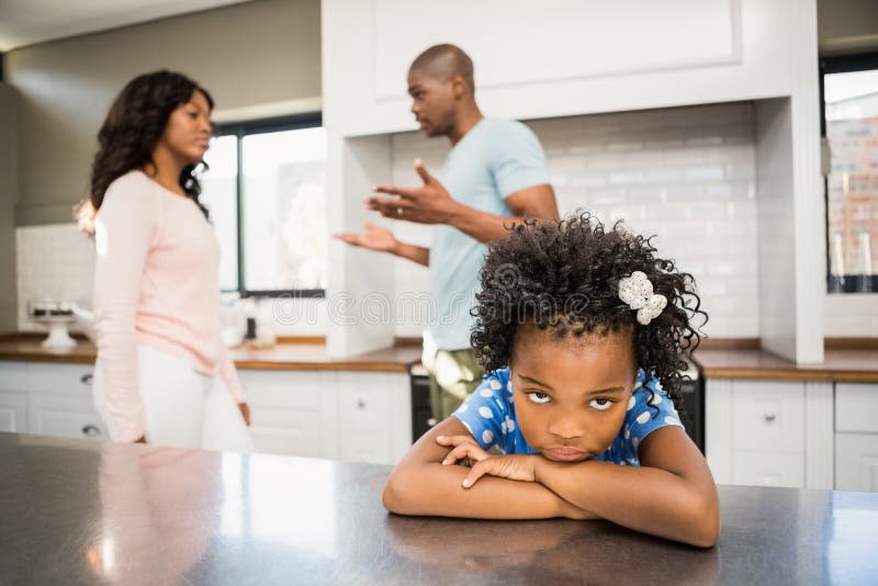 Parents Arguing in Front of Daughter Stock Photo - Image of family ...