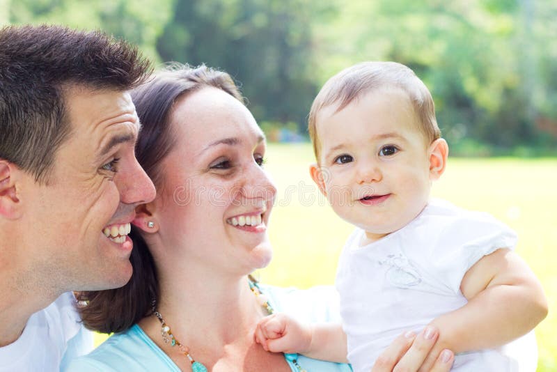 Parents and baby stock image. Image of fatherhood, happy - 13563643