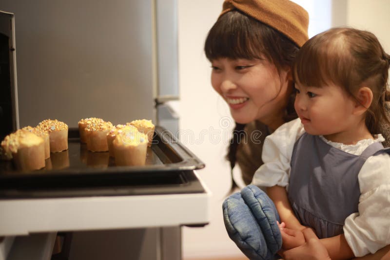 Parents and Children Making Sweets Stock Photo - Image of eating, child ...