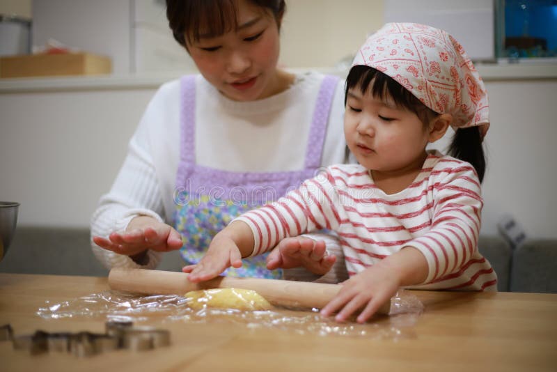 Parents and Children Making Sweets Stock Photo - Image of childcare ...