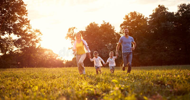 Parents with Children in Nature Stock Photo - Image of green, parents ...