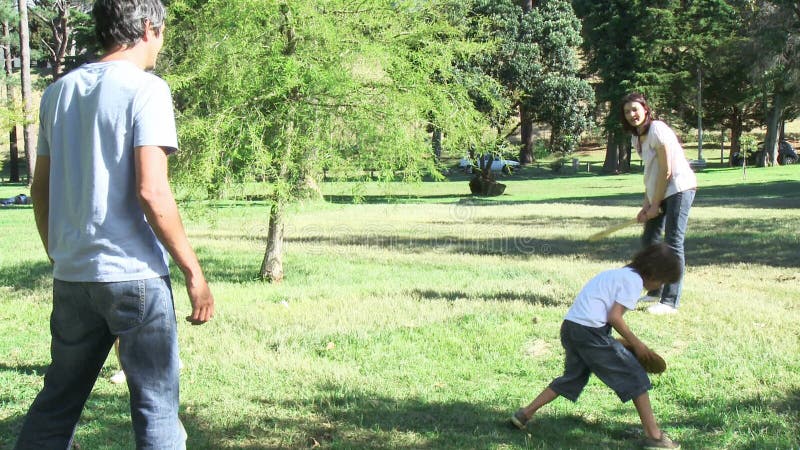 Parents and Children Playing Baseball in a Park Stock Video - Video of ...
