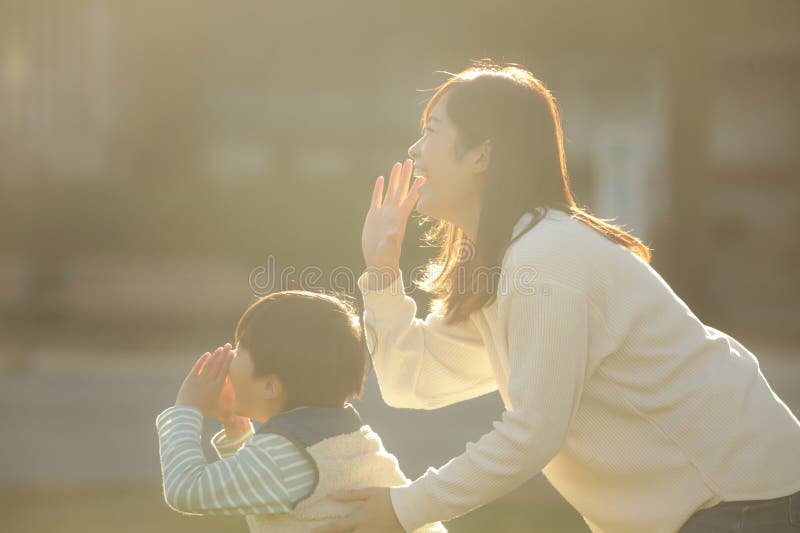 Parents and Children Shouting Out Loud Stock Photo - Image of sunset ...