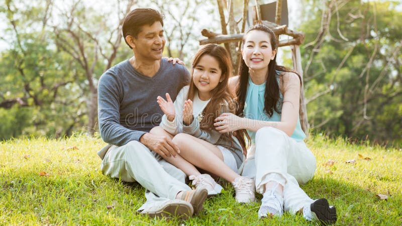 Parents and Daughter Happy and Fun in the Park Stock Image - Image of ...