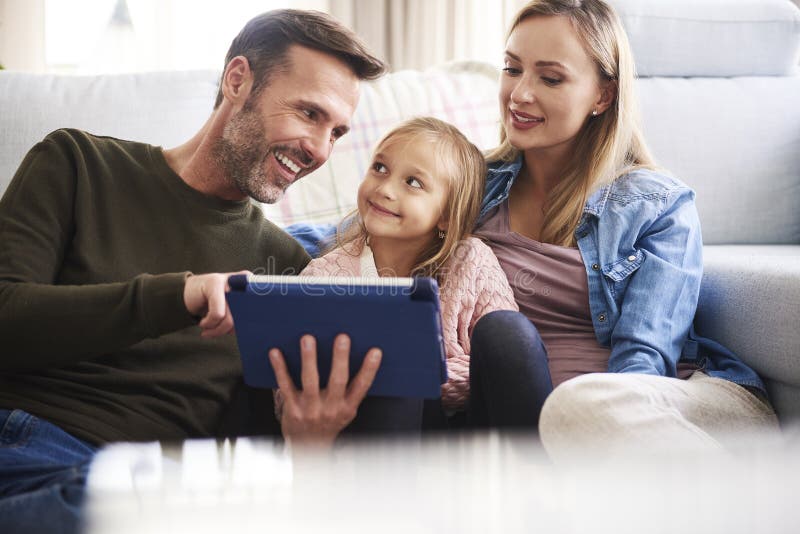 Family using a tablet stock image. Image of care, horizontal - 172214965