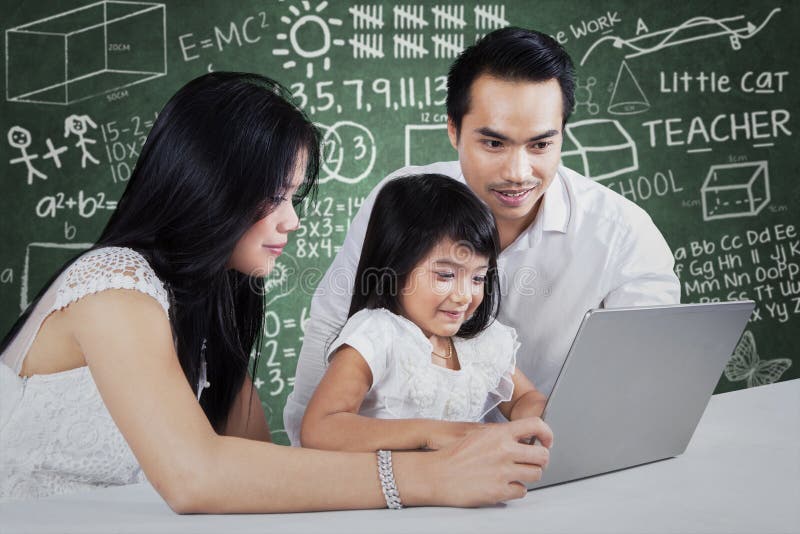 Parents Giving E-learning Education Stock Photo - Image of blackboard ...