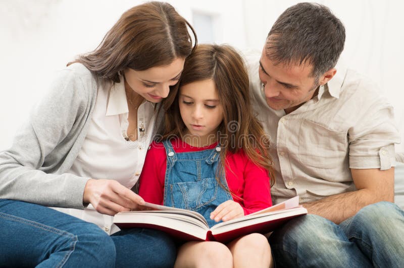Parents Helping Daughter in Studies Stock Image - Image of father ...