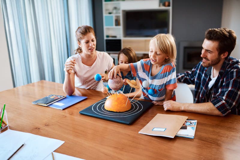 Parents, Kids and Science Project for School in Home, Building Solar ...