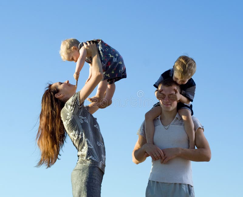 Parents playing with kids. stock image. Image of baby - 6012417