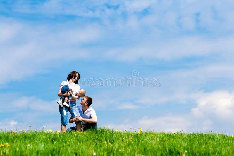Mom, dad and their son stock photo. Image of offspring - 10119346