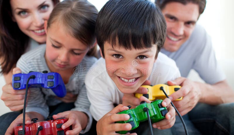 Parents Playing Video Games with Their Children Stock Photo - Image of ...