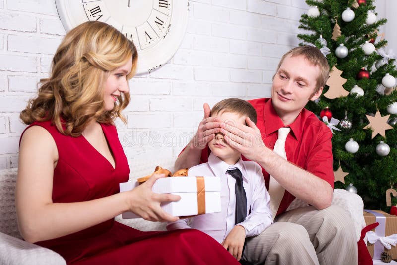 Parents Surprise Their Son with Gift Box Stock Photo - Image of holiday ...