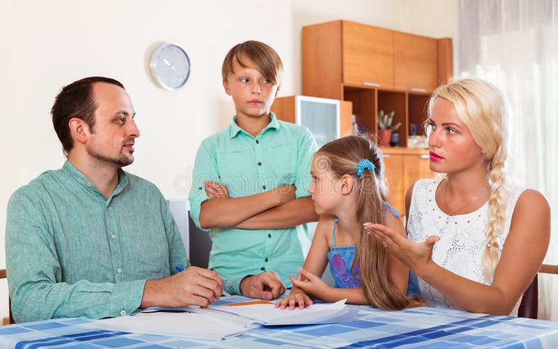 Parents Talk about Serious Financial Problems Stock Photo - Image of ...