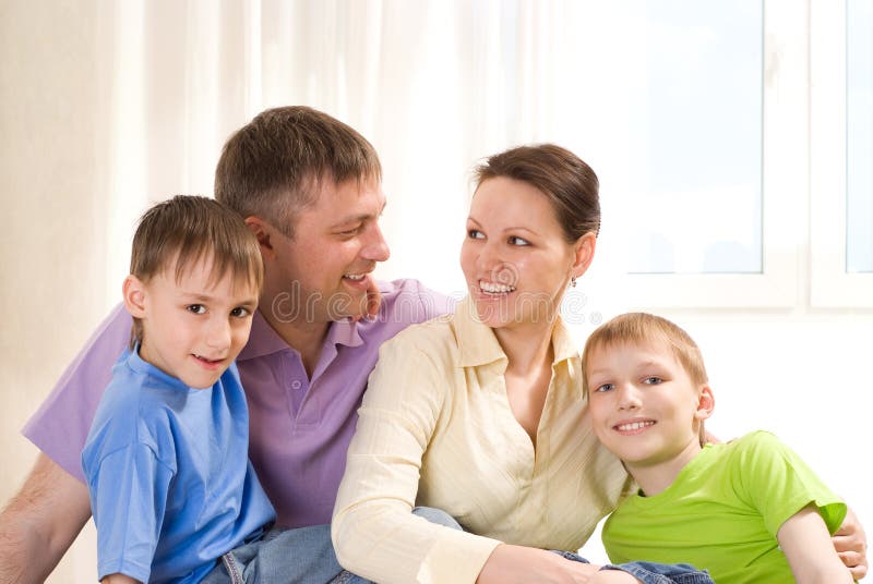 Parents with Their Two Children Stock Photo - Image of caucasian ...
