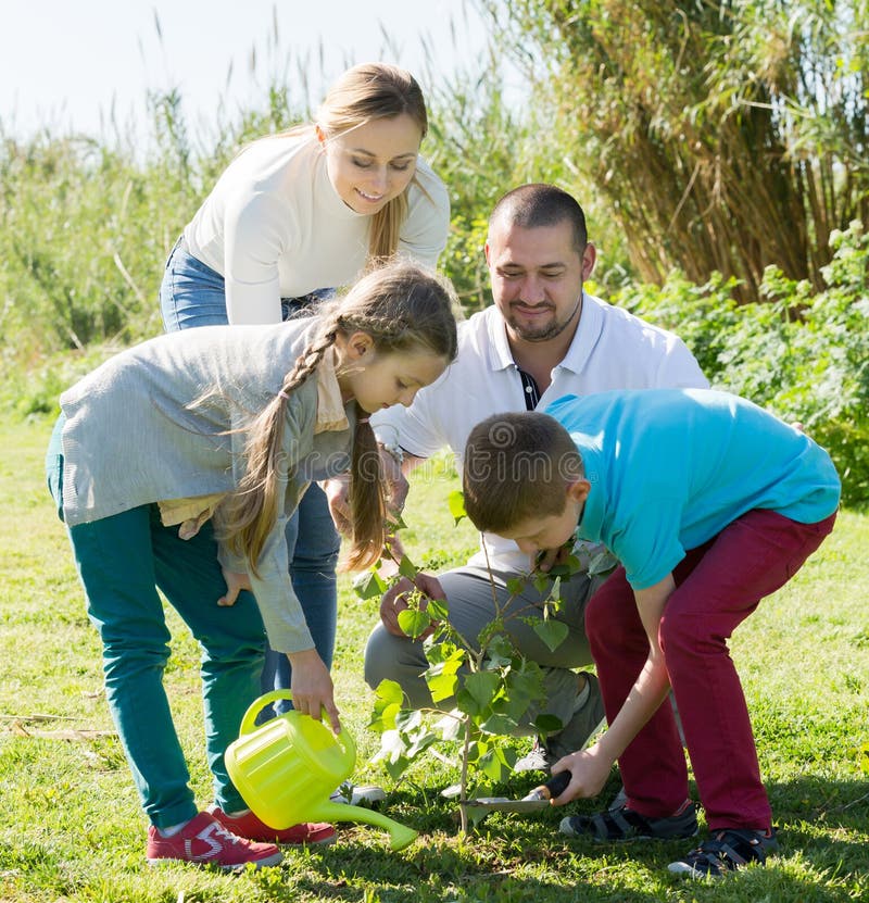Parents Kids Planting Tree Stock Photos - Free & Royalty-Free Stock ...