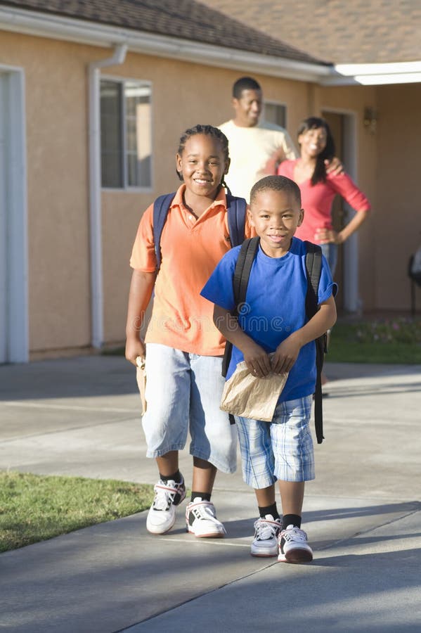 Parents Watching Children Leave House Stock Image - Image of full ...