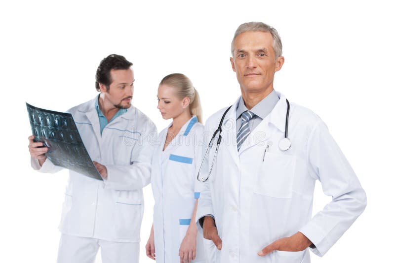 Doutores com tomogram imagem de stock. Imagem de fêmeas - 13897549