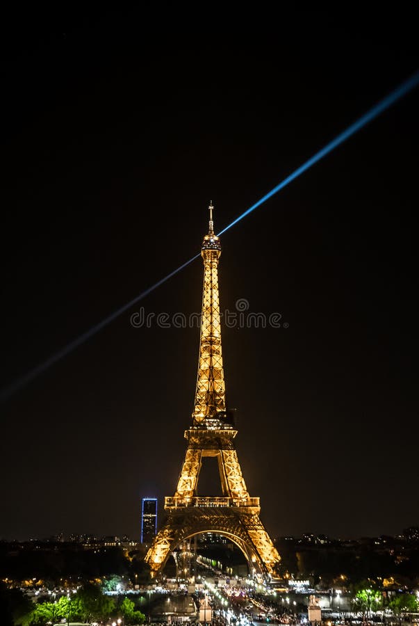 Illuminated Eiffel Tower with Light Beam and Bridge Pont D Léna in the ... Illuminated Eiffel Tower with Light Beam and Bridge Pont D Léna in the ...