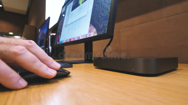Man Working at Mac Mini Computer - Side View Stock Video - Video of ...