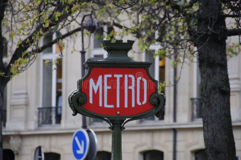 Red metro sign in Paris editorial stock photo. Image of metro - 4135783
