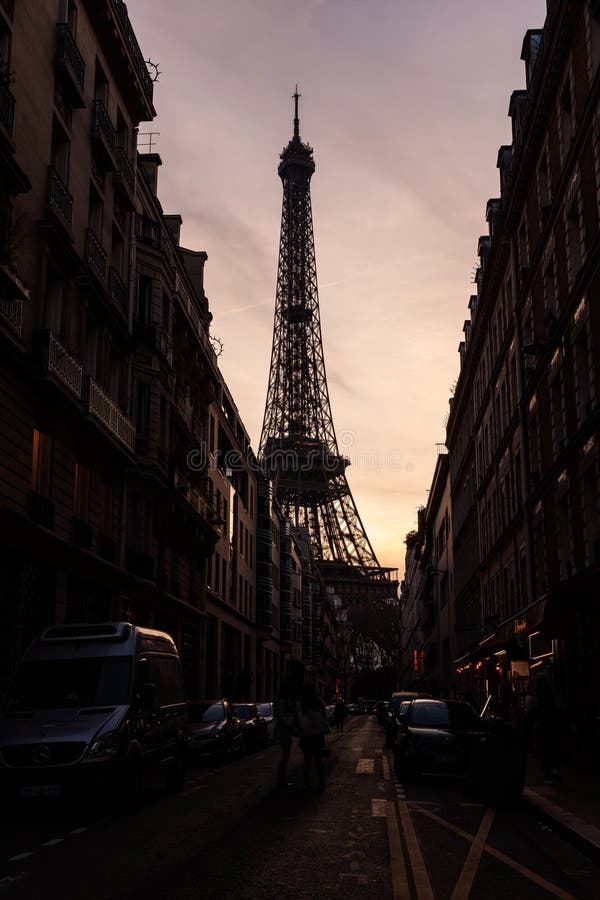 Paris Street at Sunset, Eiffel Tower in the Background Stock Image ...