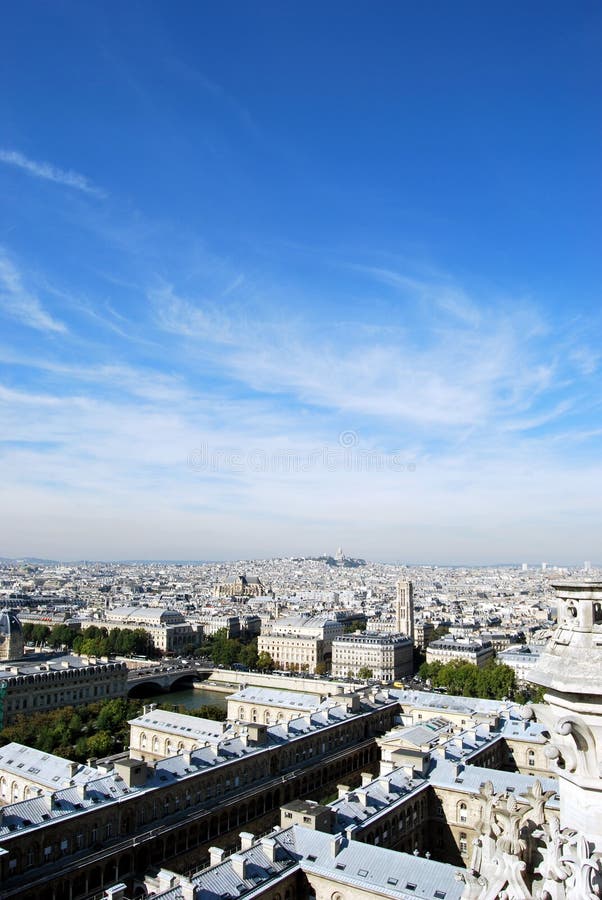 Paris under blue sky stock photo. Image of dame, buildings - 12947492