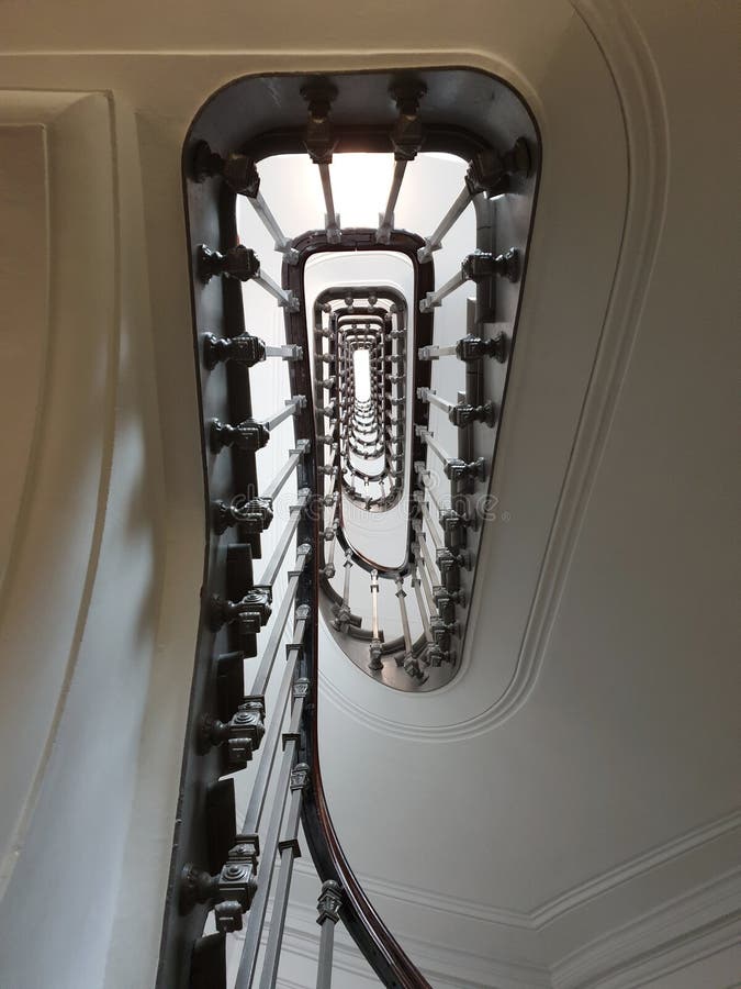 Parisian Staircase View from Below Stock Image - Image of staircase ...
