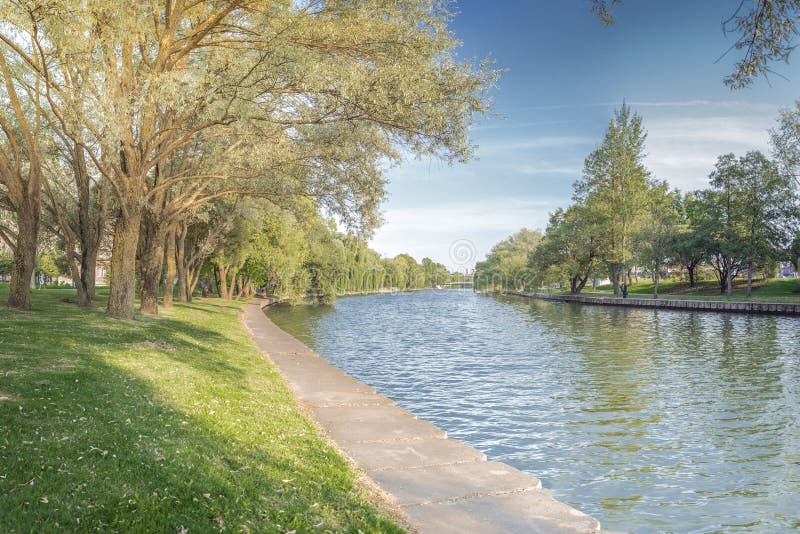 Park Along River and Green Trees. Beautiful Landscape Stock Photo ...