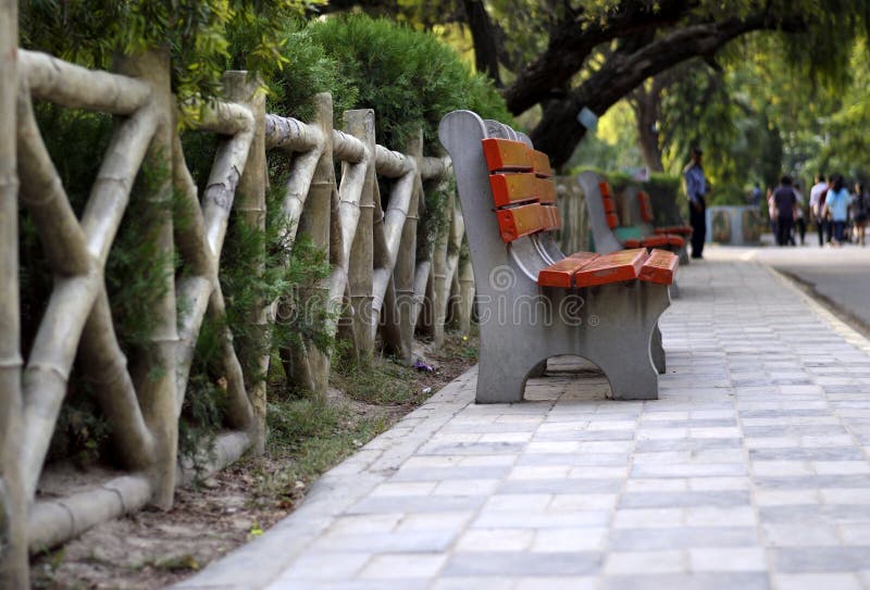 Park bench stock photo. Image of park, bench, plant - 128880980