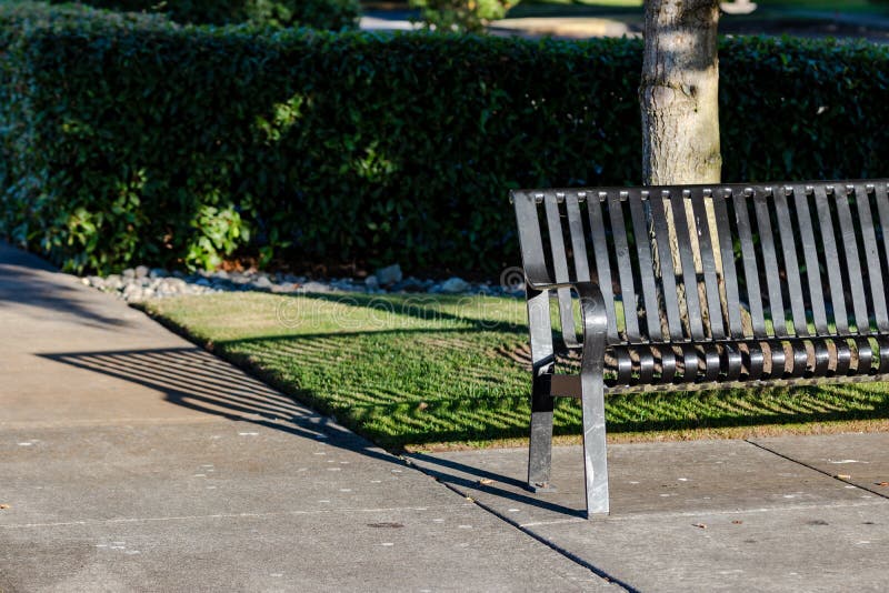 Bench Casting Shadow on Wooden Deck Stock Image - Image of boards ...