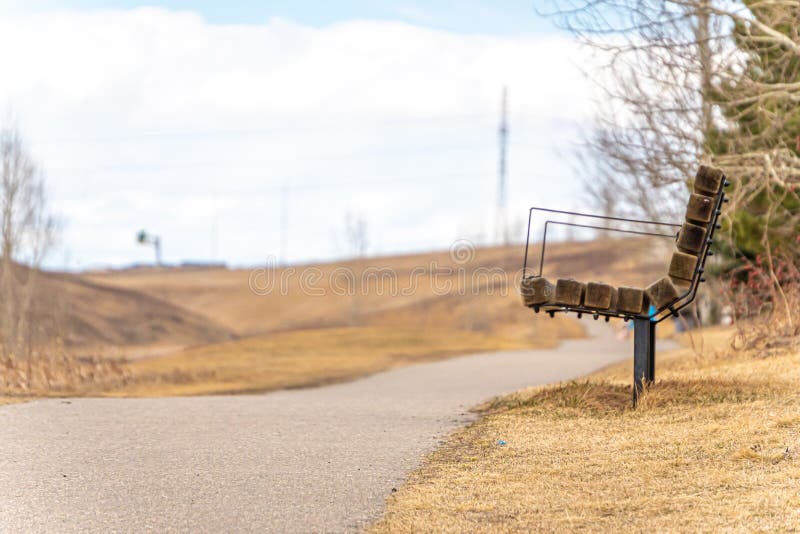 Park Bench beside Footpath in City Public Park Stock Photo - Image of ...