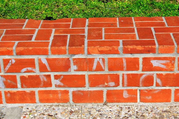 Park bench made of bricks stock photo. Image of city - 180939080