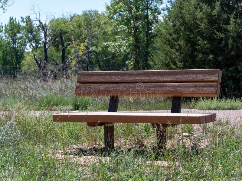 A Park Bench in a Rustic Field Stock Image - Image of sitting, yard ...