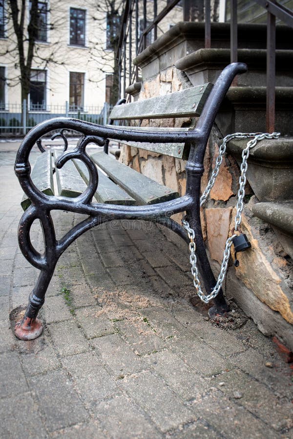 Park Bench Secured with Chain and Lock, Outdoor Urban Setting Stock ...