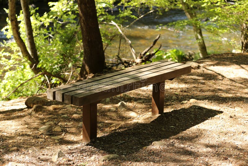 Park Bench in the Outdoors stock image. Image of horizontal - 250270741