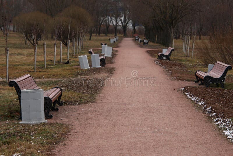 Park Benches Along the Sandy Path Stock Image - Image of empty, colored ...