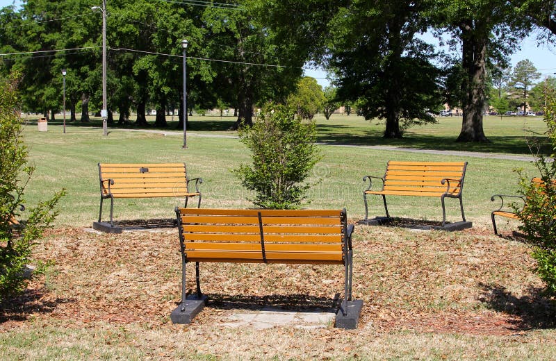 Park Benches In A Grassy Field On A Sunny Day Stock Photo - Image of ...