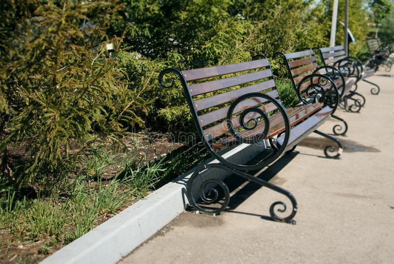 Park benches lot vintage stock photo. Image of object - 159861820