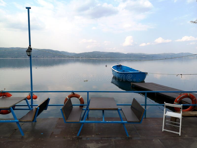 Park Boat in the Lake with an Empty Cafe Stock Image - Image of benches ...