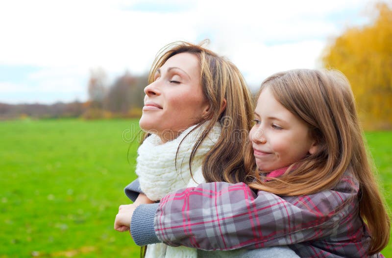 Mom Receiving Hug stock image. Image of beautiful, pretty - 15273005