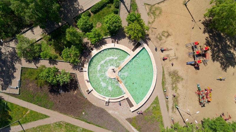 Park with a Fountain and a Playground Editorial Stock Image - Image of ...