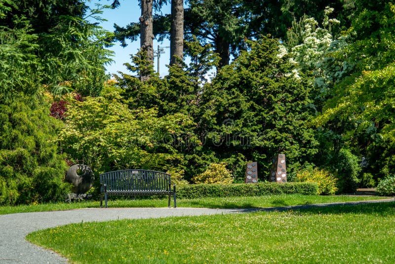 Park Garden Bench Along the Path Stock Image - Image of sunshine ...