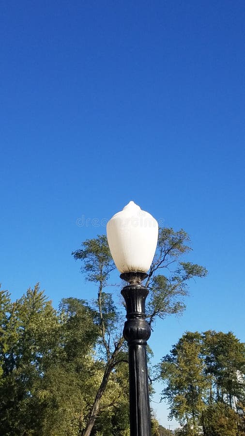 Park lamp post stock photo. Image of park, silhouette - 129592452