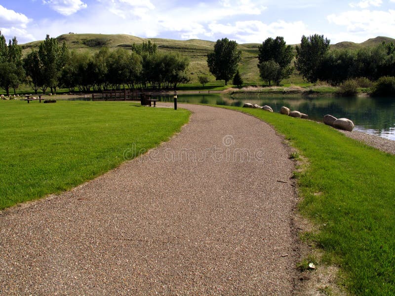 Park Pathway stock image. Image of bench, grass, alberta - 4993