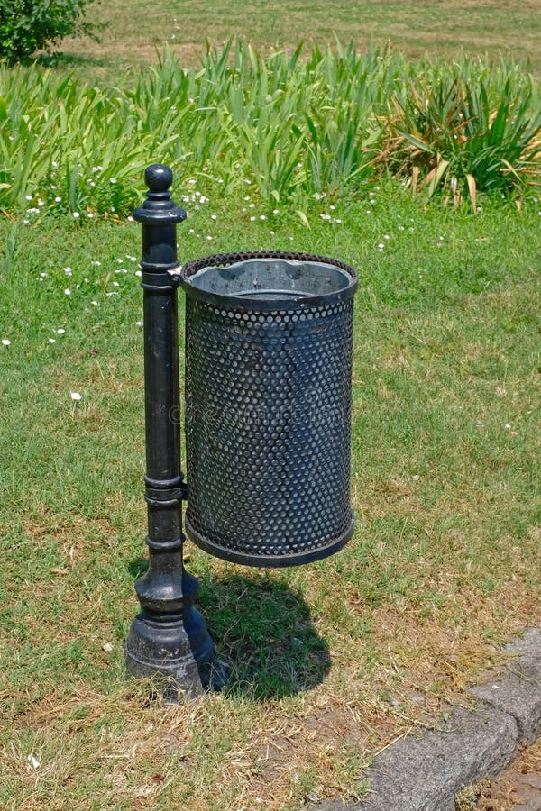 Park trash can pole stock image. Image of waste, grass - 262516855