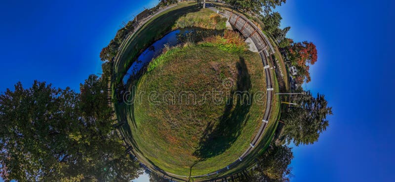 Park with Trees and Pond in Little Planet Effect Stock Image - Image of ...