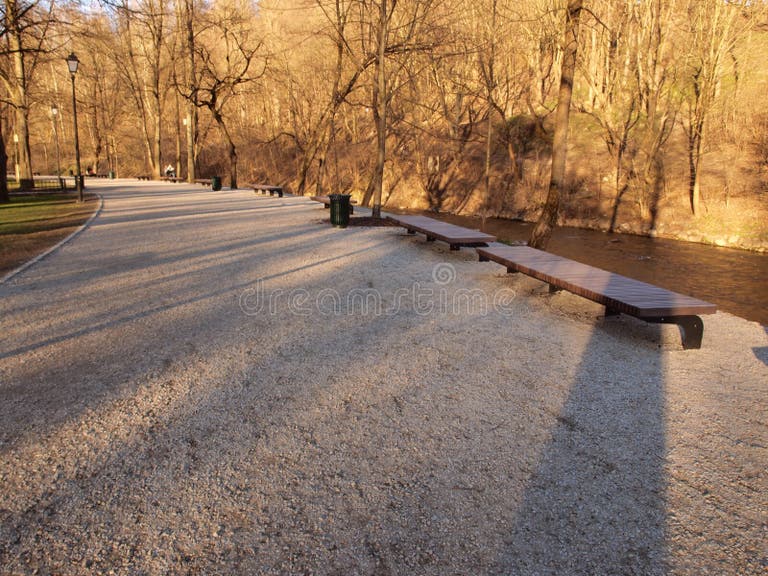 Park Walk with Benches in Spring Stock Image - Image of path, garden ...