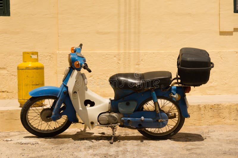 Parked blue moped stock photo. Image of street, travel - 66620546