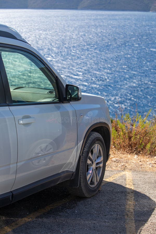 Parked car near the sea stock photo. Image of nature - 275752196