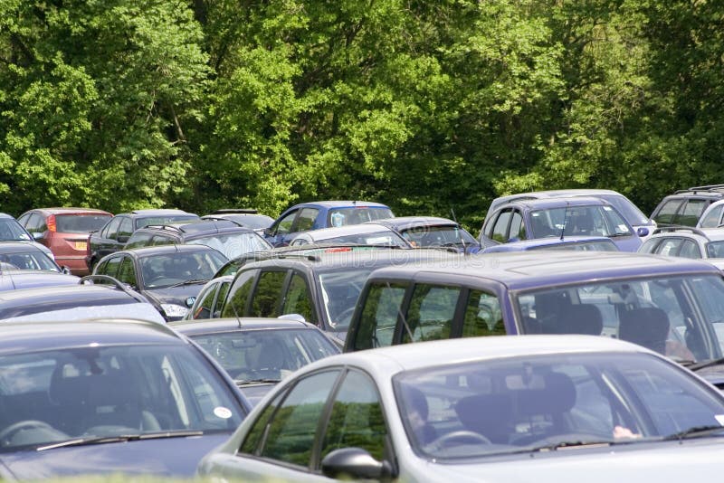 Parked cars. stock image. Image of parked, cars, field - 5241509